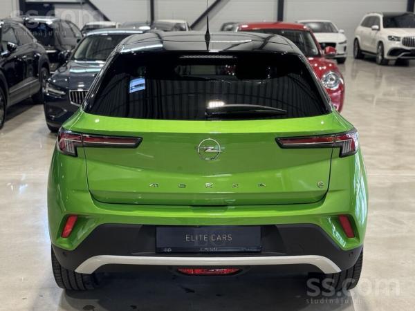 Green Opel Mokka 2021 in Riga, with an engine capacity of 1.60 L and mileage of 80 thousand km for 18990 €, photo 6 on AUTOMOTO.COM.LV