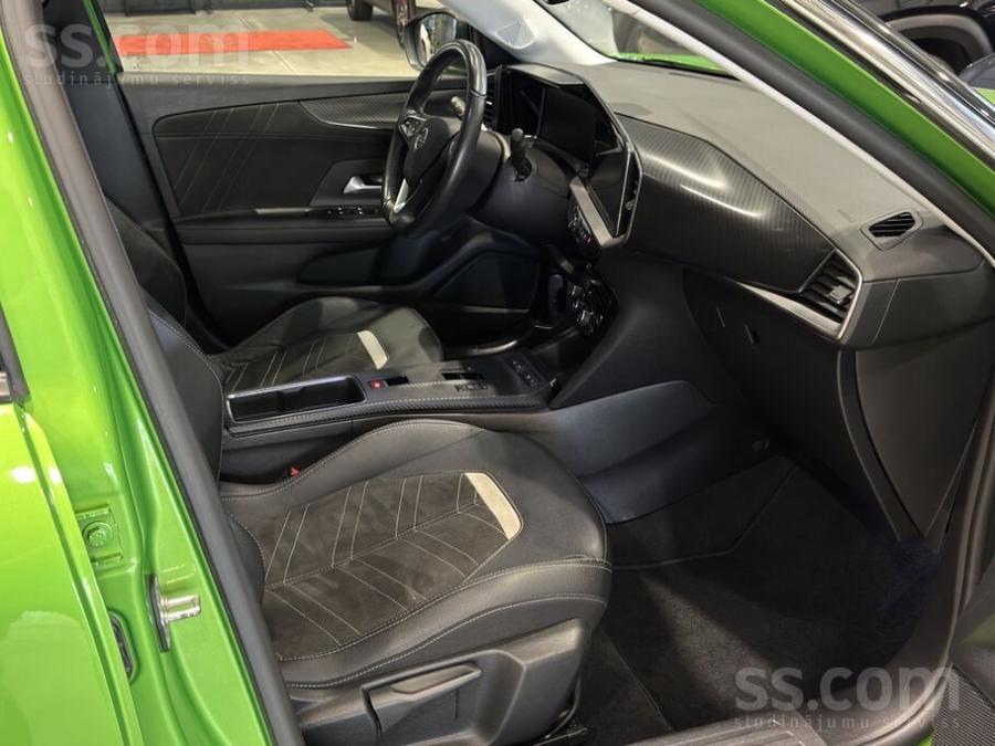 Green Opel Mokka 2021 in Riga, with an engine capacity of 1.60 L and mileage of 80 thousand km for 18990 €, photo 12 on AUTOMOTO.COM.LV