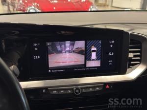 Green Opel Mokka 2021 in Riga, with an engine capacity of 1.60 L and mileage of 80 thousand km for 18990 €, photo 18 on AUTOMOTO.COM.LV
