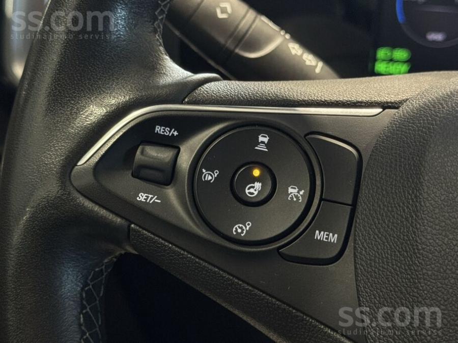 Green Opel Mokka 2021 in Riga, with an engine capacity of 1.60 L and mileage of 80 thousand km for 18990 €, photo 26 on AUTOMOTO.COM.LV