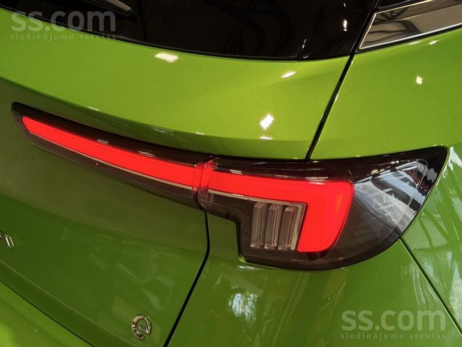 Green Opel Mokka 2021 in Riga, with an engine capacity of 1.60 L and mileage of 80 thousand km for 18990 €, photo 32 on AUTOMOTO.COM.LV