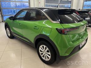 Green Opel Mokka 2022 in Riga, with an engine capacity of 1.20 L and mileage of 59 thousand km for 14700 €, photo 4 on AUTOMOTO.COM.LV