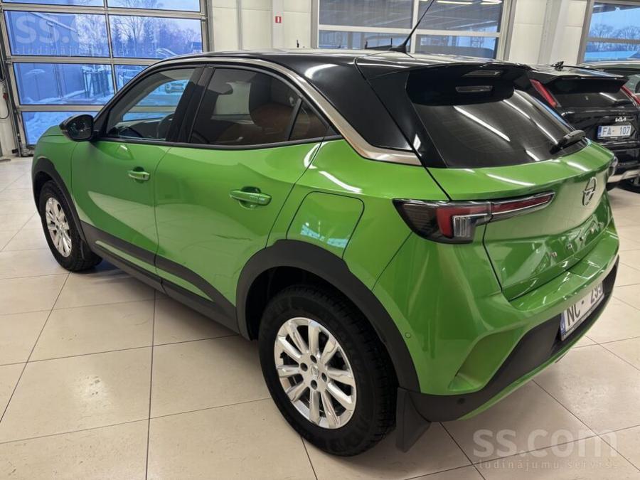 Green Opel Mokka 2022 in Riga, with an engine capacity of 1.20 L and mileage of 59 thousand km for 14700 €, photo 4 on AUTOMOTO.COM.LV
