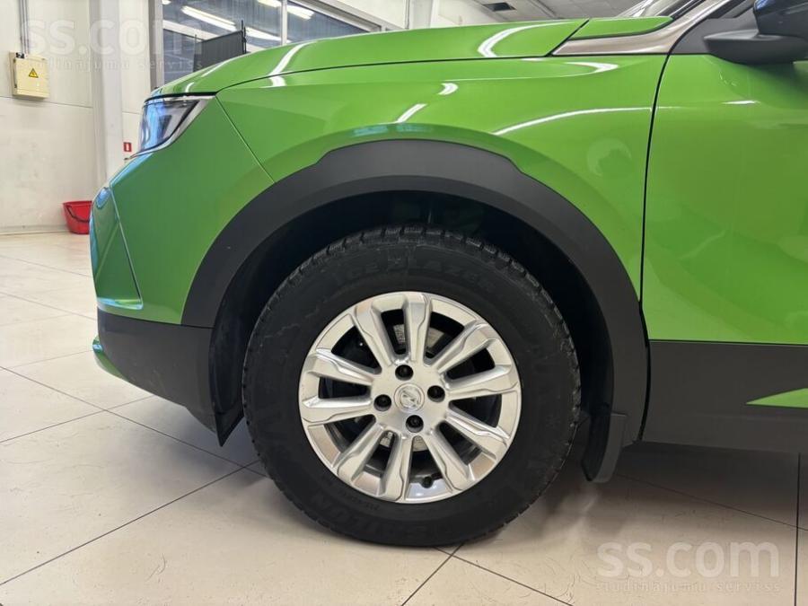 Green Opel Mokka 2022 in Riga, with an engine capacity of 1.20 L and mileage of 59 thousand km for 14700 €, photo 5 on AUTOMOTO.COM.LV