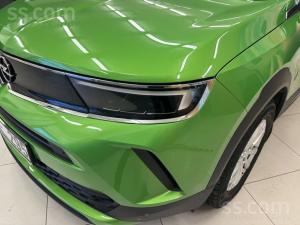 Green Opel Mokka 2022 in Riga, with an engine capacity of 1.20 L and mileage of 59 thousand km for 14700 €, photo 6 on AUTOMOTO.COM.LV