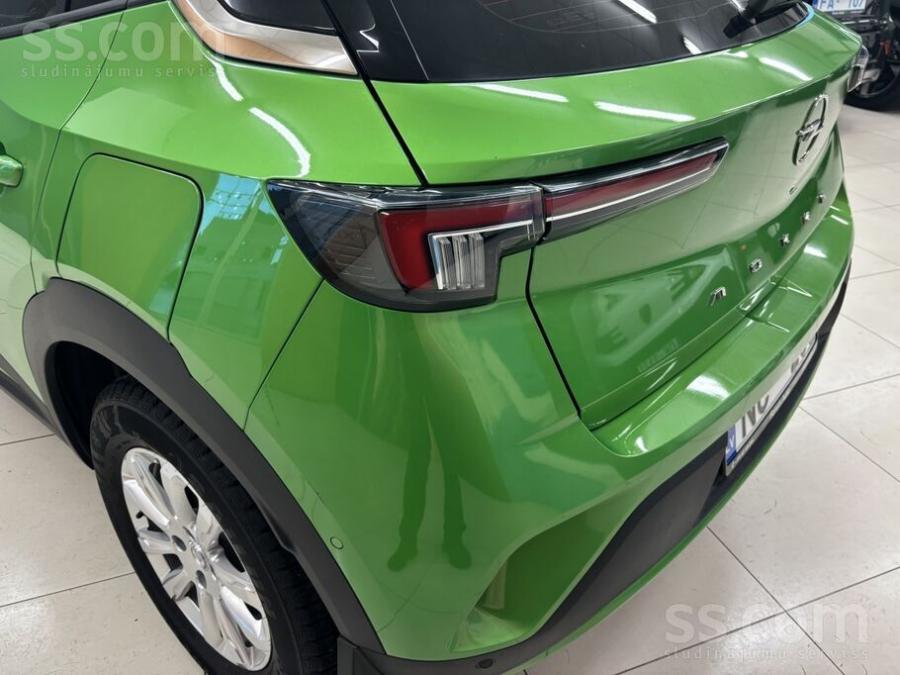 Green Opel Mokka 2022 in Riga, with an engine capacity of 1.20 L and mileage of 59 thousand km for 14700 €, photo 7 on AUTOMOTO.COM.LV