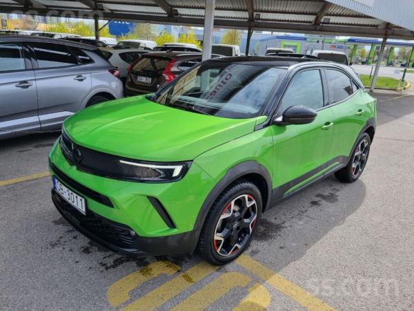 Green Opel Mokka 2023 in Riga, with an engine capacity of 1.20 L and mileage of 38 thousand km for 20900 €, photo 1 on AUTOMOTO.COM.LV