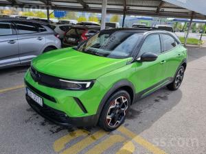 Green Opel Mokka 2023 in Riga, with an engine capacity of 1.20 L and mileage of 38 thousand km for 20900 €, photo  on AUTOMOTO.COM.LV