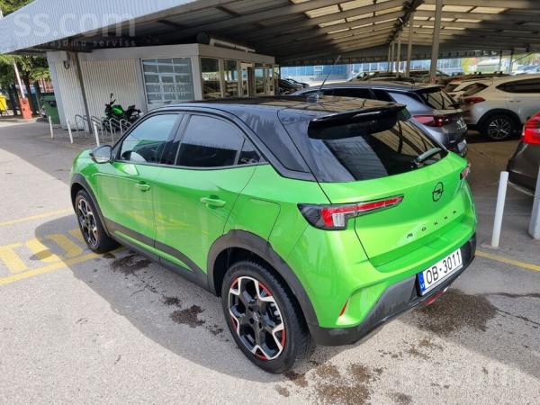 Green Opel Mokka 2023 in Riga, with an engine capacity of 1.20 L and mileage of 38 thousand km for 20900 €, photo 4 on AUTOMOTO.COM.LV