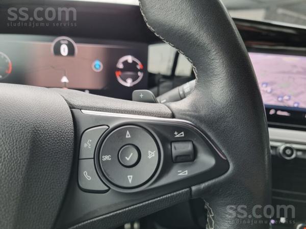 Green Opel Mokka 2023 in Riga, with an engine capacity of 1.20 L and mileage of 38 thousand km for 20900 €, photo 7 on AUTOMOTO.COM.LV