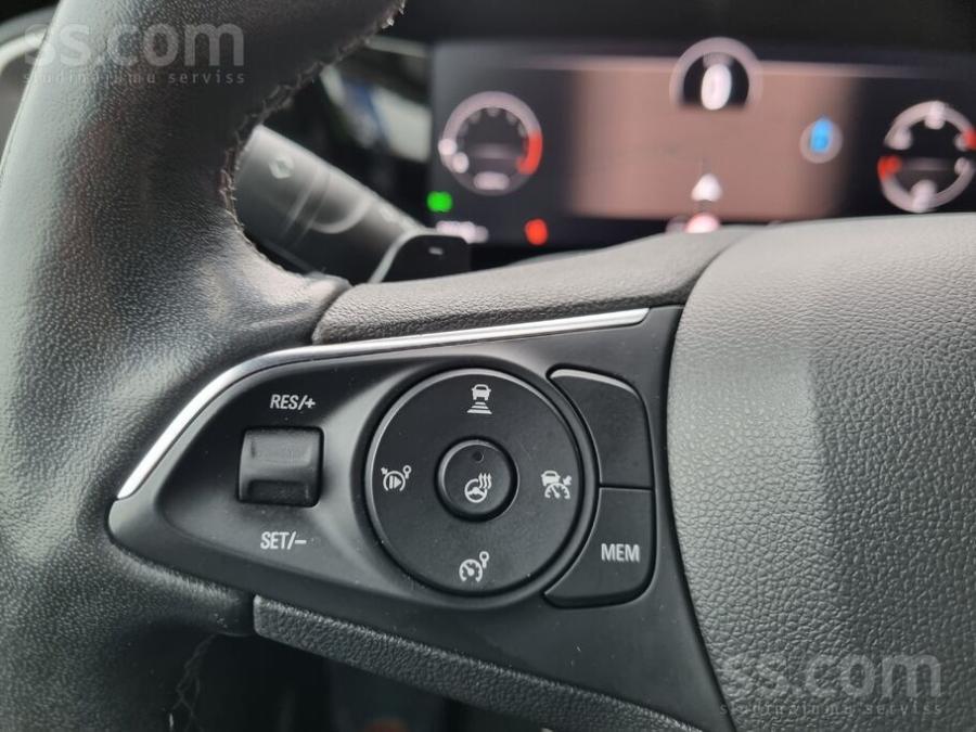 Green Opel Mokka 2023 in Riga, with an engine capacity of 1.20 L and mileage of 38 thousand km for 20900 €, photo 9 on AUTOMOTO.COM.LV
