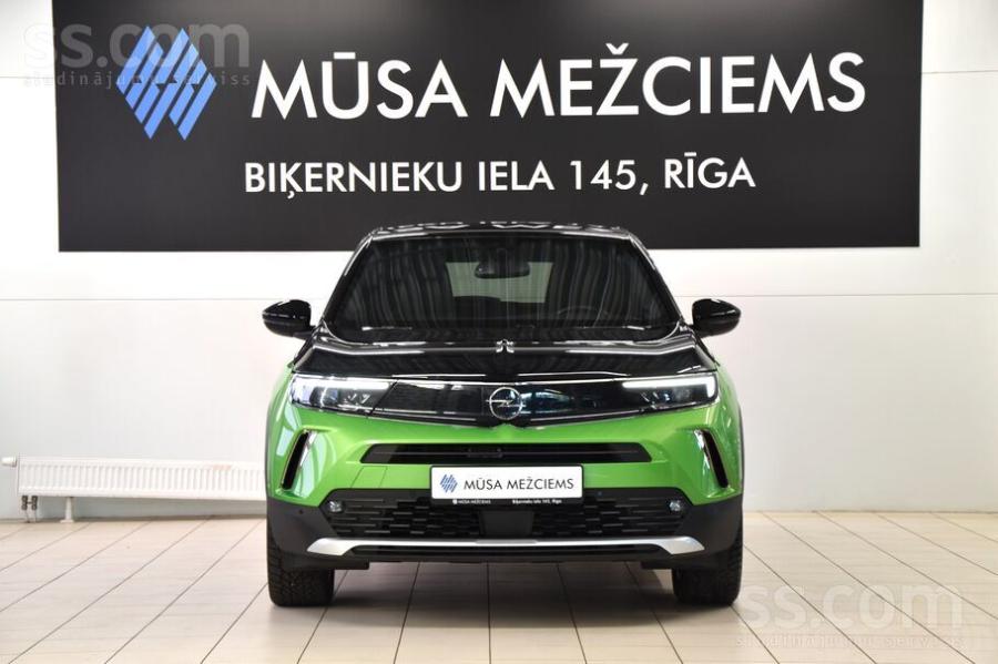 Green Opel Mokka 2021 in Riga, with an engine capacity of 1.70 L and mileage of 71 thousand km for 18990 €, photo 3 on AUTOMOTO.COM.LV