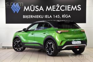 Green Opel Mokka 2021 in Riga, with an engine capacity of 1.70 L and mileage of 71 thousand km for 18990 €, photo 9 on AUTOMOTO.COM.LV