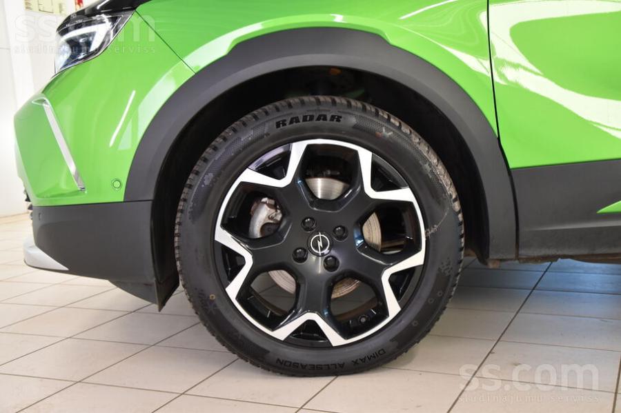 Green Opel Mokka 2021 in Riga, with an engine capacity of 1.70 L and mileage of 71 thousand km for 18990 €, photo 12 on AUTOMOTO.COM.LV