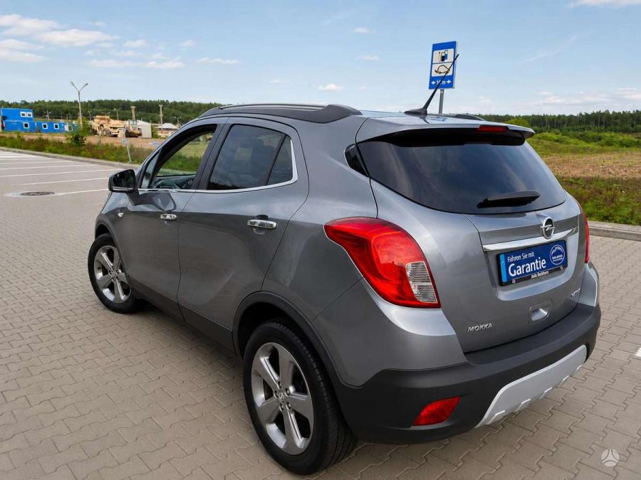 Grey Opel Mokka 2013 in Vilnius, with an engine capacity of 1.69 L and mileage of 272 thousand km for 6250 €, photo 5 on AUTOMOTO.COM.LV