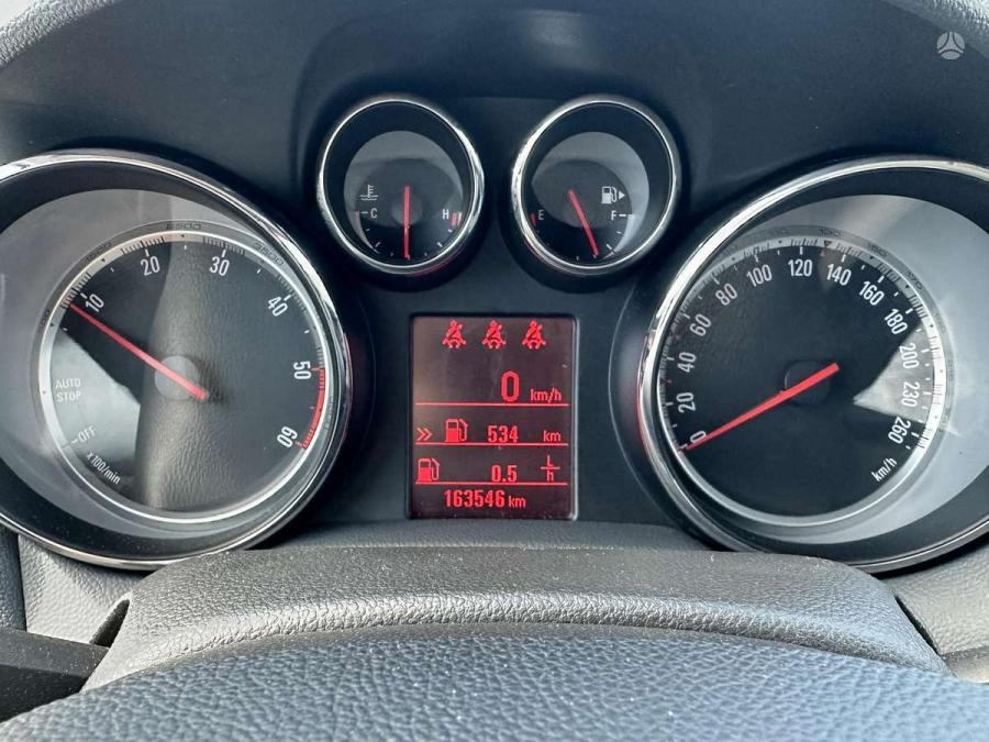 Grey Opel Mokka 2013 in Alytus, with an engine capacity of 1.69 L and mileage of 164 thousand km for 6880 €, photo 13 on AUTOMOTO.COM.LV