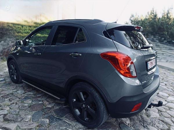 Grey Opel Mokka 2014 in Utena, with an engine capacity of 1.69 L and mileage of 117 thousand km for 11450 €, photo 3 on AUTOMOTO.COM.LV