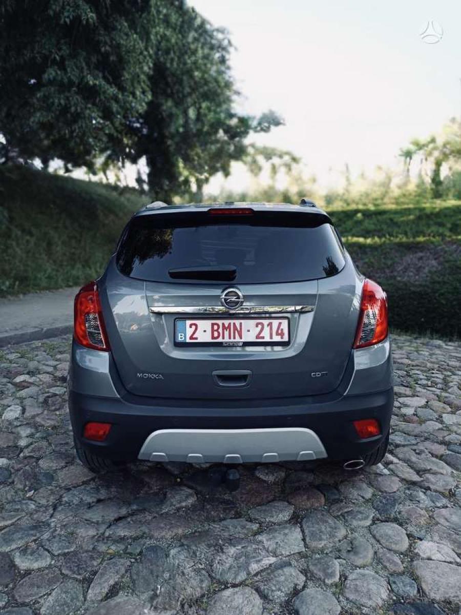 Grey Opel Mokka 2014 in Utena, with an engine capacity of 1.69 L and mileage of 117 thousand km for 11450 €, photo 8 on AUTOMOTO.COM.LV