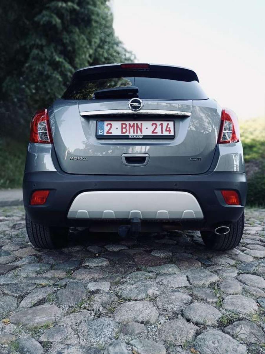 Grey Opel Mokka 2014 in Utena, with an engine capacity of 1.69 L and mileage of 117 thousand km for 11450 €, photo 16 on AUTOMOTO.COM.LV