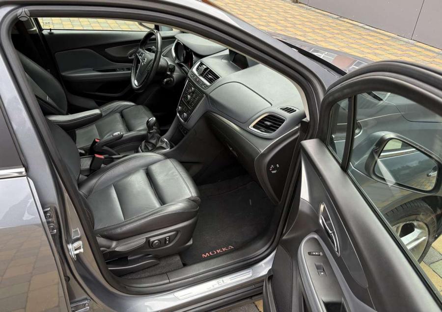 Grey Opel Mokka 2014 in Druskininkai, with an engine capacity of 1.69 L and mileage of 202 thousand km for 7300 €, photo 12 on AUTOMOTO.COM.LV