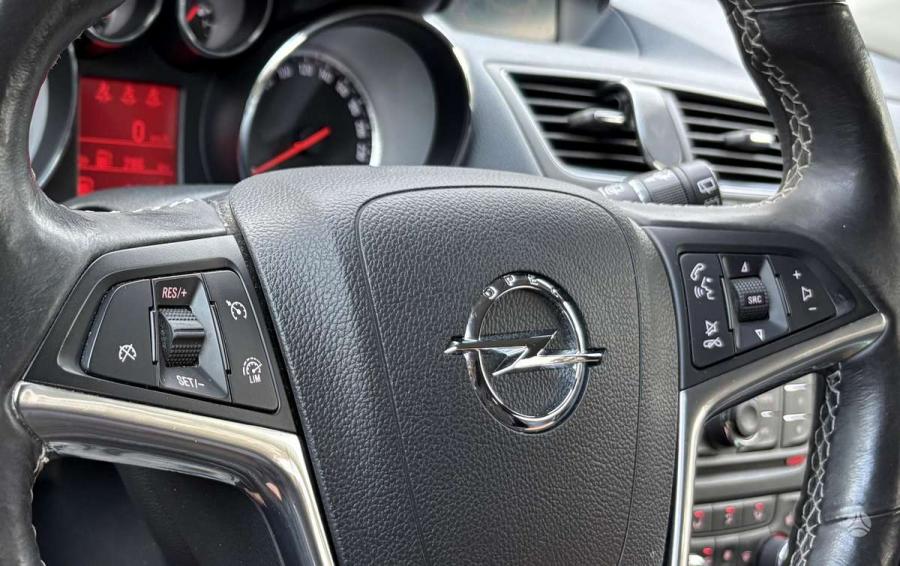 Grey Opel Mokka 2014 in Druskininkai, with an engine capacity of 1.69 L and mileage of 202 thousand km for 7300 €, photo 24 on AUTOMOTO.COM.LV