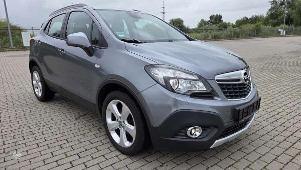 Grey Opel Mokka 2014 in Marijampole, with an engine capacity of 1.36 L and mileage of 139 thousand km for 7100 €, photo 1 on AUTOMOTO.COM.LV