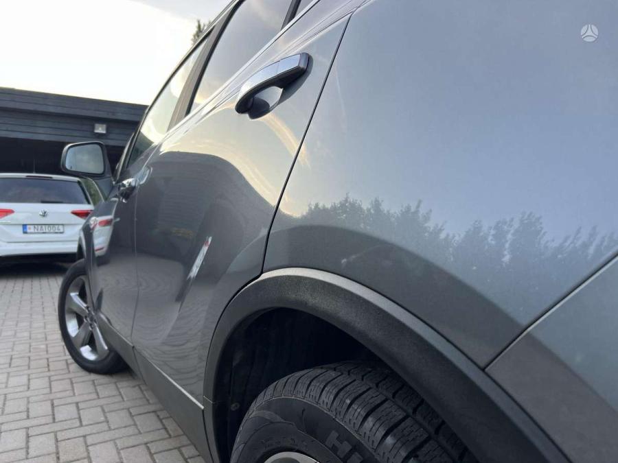 Grey Opel Mokka 2014 in Druskininkai, with an engine capacity of 1.69 L and mileage of 153 thousand km for 7290 €, photo 16 on AUTOMOTO.COM.LV