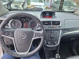 Pelēks Opel Mokka 2015 Marijampole, ar dzinēja tilpumu 1.60 L un nobraukumu 20 tūkst. km par 6300 €, foto 24 vietnē AUTOMOTO.COM.LV
