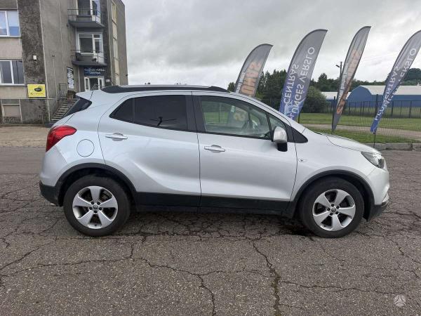 Grey Opel Mokka 2016 in Plunge, with an engine capacity of 1.40 L and mileage of 223 thousand km for 7950 €, photo 6 on AUTOMOTO.COM.LV
