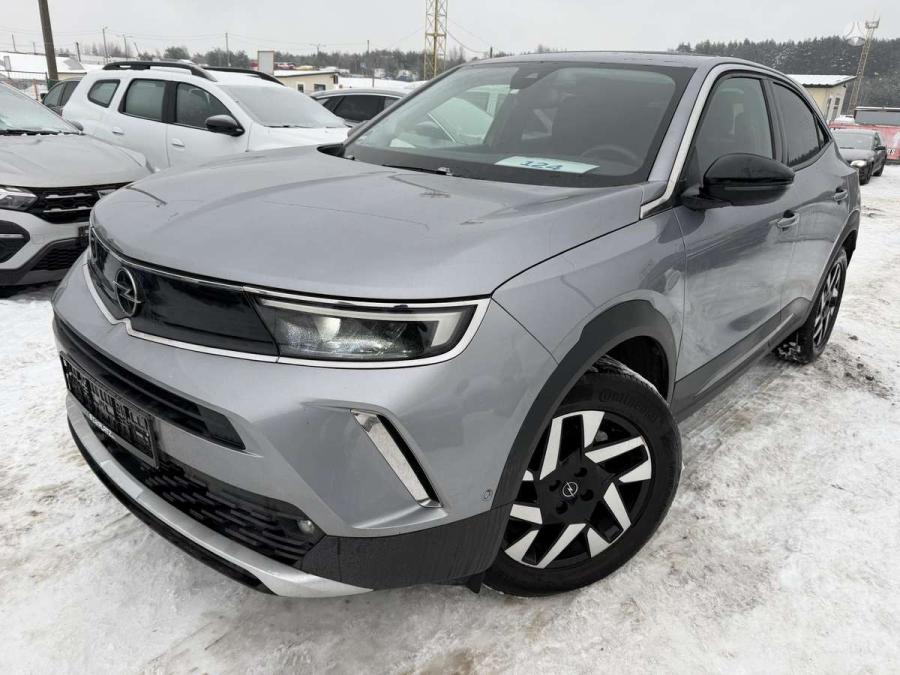 Grey Opel Mokka 2022 in Vilnius, with an engine capacity of 1.20 L and mileage of 200 thousand km for 13900 €, photo 1 on AUTOMOTO.COM.LV