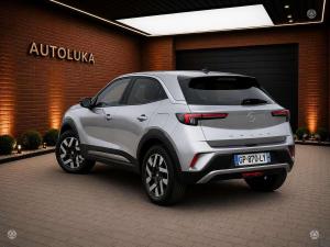 Grey Opel Mokka 2023 in Marijampole, with an engine capacity of 1.20 L and mileage of 24 thousand km for 16698 €, photo 3 on AUTOMOTO.COM.LV