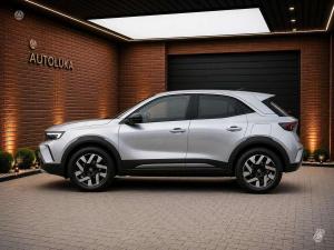 Grey Opel Mokka 2023 in Marijampole, with an engine capacity of 1.20 L and mileage of 24 thousand km for 16698 €, photo 8 on AUTOMOTO.COM.LV