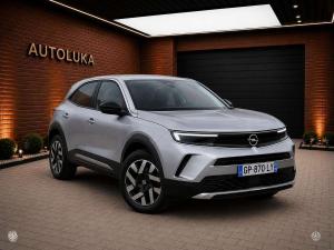 Grey Opel Mokka 2023 in Marijampole, with an engine capacity of 1.20 L and mileage of 24 thousand km for 16577 €, photo 4 on AUTOMOTO.COM.LV