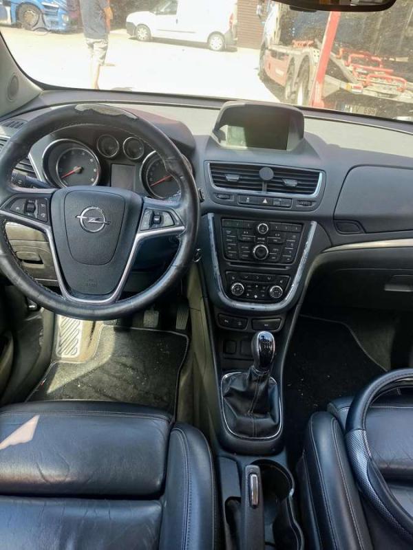 Grey Opel Mokka 2013 in Kaunas, with an engine capacity of 1.70 L and mileage of 208 thousand km for 3600 €, photo 1 on AUTOMOTO.COM.LV
