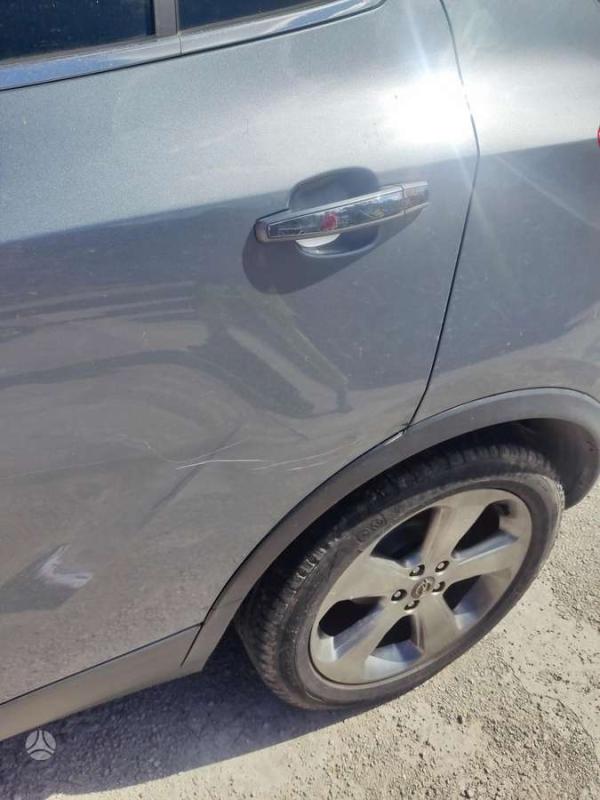 Grey Opel Mokka 2013 in Kaunas, with an engine capacity of 1.70 L and mileage of 208 thousand km for 3600 €, photo 3 on AUTOMOTO.COM.LV