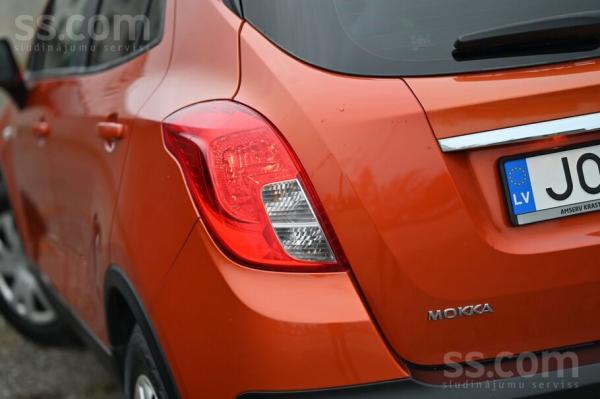 Orange Opel Mokka 2014 in Jelgava, with an engine capacity of 1.60 L and mileage of 101 thousand km for 6650 €, photo 10 on AUTOMOTO.COM.LV