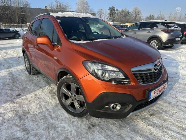 Orange Opel Mokka 2014 in Alytus, with an engine capacity of 1.36 L and mileage of 244 thousand km for 6900 €, photo 1 on AUTOMOTO.COM.LV