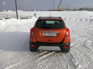 Orange Opel Mokka 2015 in Vilnius, with an engine capacity of 1.36 L and mileage of 110 thousand km for 7999 €, photo 5 on AUTOMOTO.COM.LV