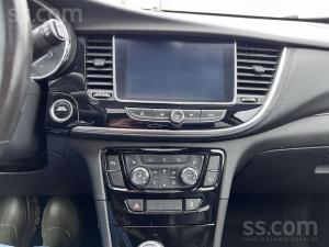 Orange Opel Mokka 2017 in Talsi, with an engine capacity of 1.60 L and mileage of 148 thousand km for 13790 €, photo 26 on AUTOMOTO.COM.LV