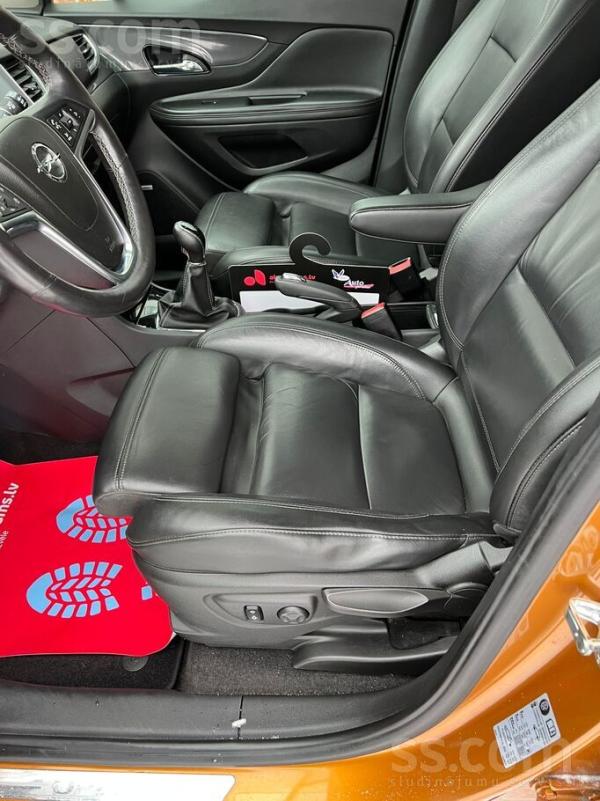 Orange Opel Mokka 2017 in Talsi, with an engine capacity of 1.60 L and mileage of 148 thousand km for 13790 €, photo 10 on AUTOMOTO.COM.LV