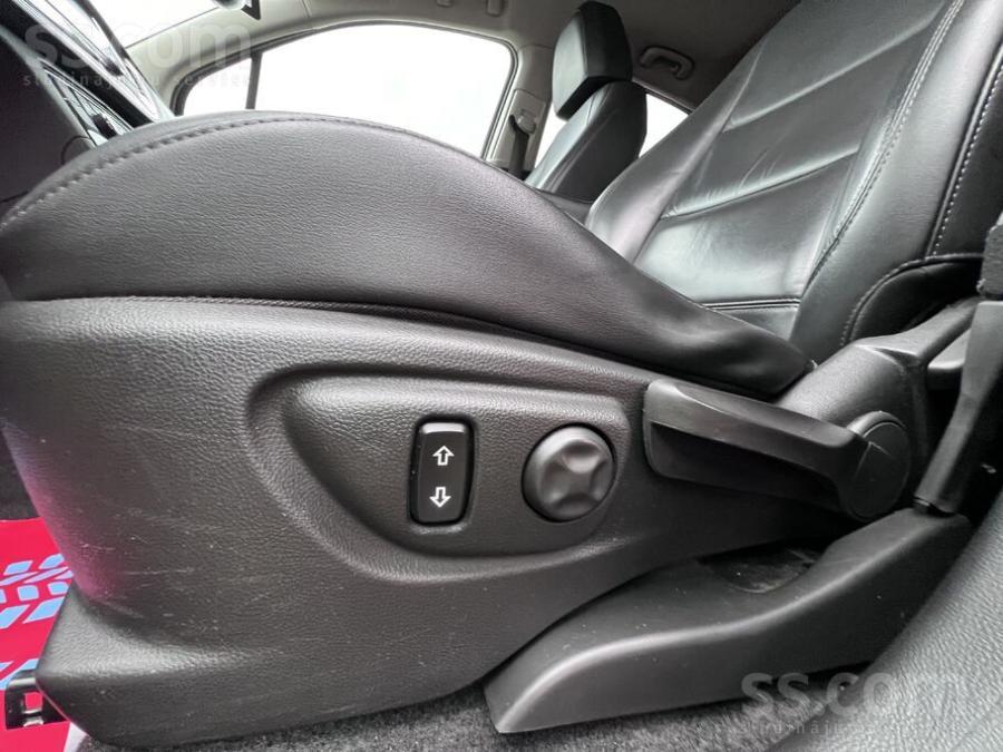 Orange Opel Mokka 2017 in Talsi, with an engine capacity of 1.60 L and mileage of 148 thousand km for 13790 €, photo 16 on AUTOMOTO.COM.LV