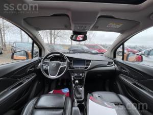 Orange Opel Mokka 2017 in Talsi, with an engine capacity of 1.60 L and mileage of 148 thousand km for 13790 €, photo 22 on AUTOMOTO.COM.LV