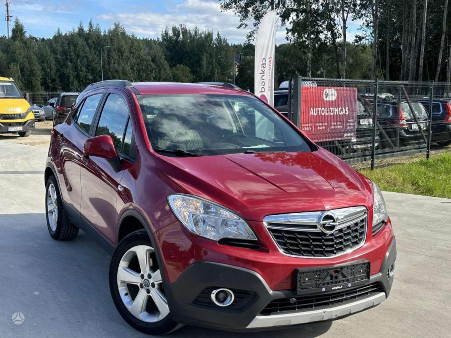 Red Opel Mokka 2013 in Alytus, with an engine capacity of 1.69 L and mileage of 249 thousand km for 6880 €, photo 1 on AUTOMOTO.COM.LV