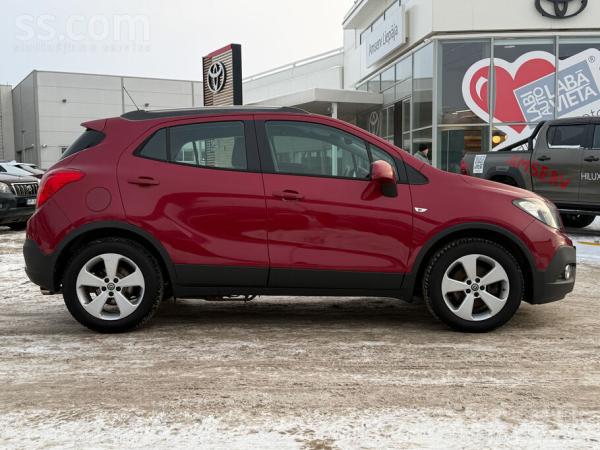 Red Opel Mokka 2014 in Liepaja, with an engine capacity of 1.40 L and mileage of 112 thousand km for 8200 €, photo 5 on AUTOMOTO.COM.LV