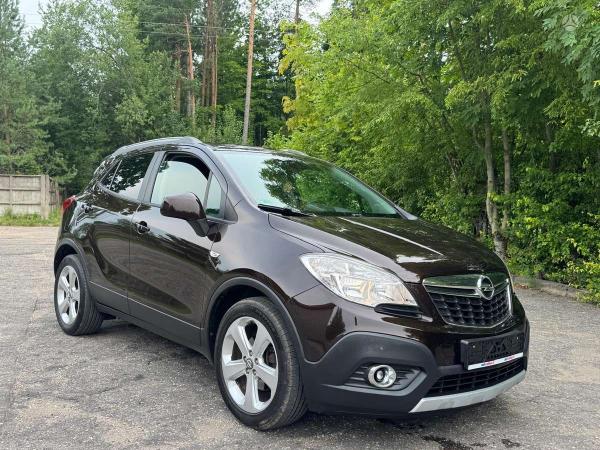 Red Opel Mokka 2014 in Utena, with an engine capacity of 1.69 L and mileage of 247 thousand km for 5800 €, photo 1 on AUTOMOTO.COM.LV