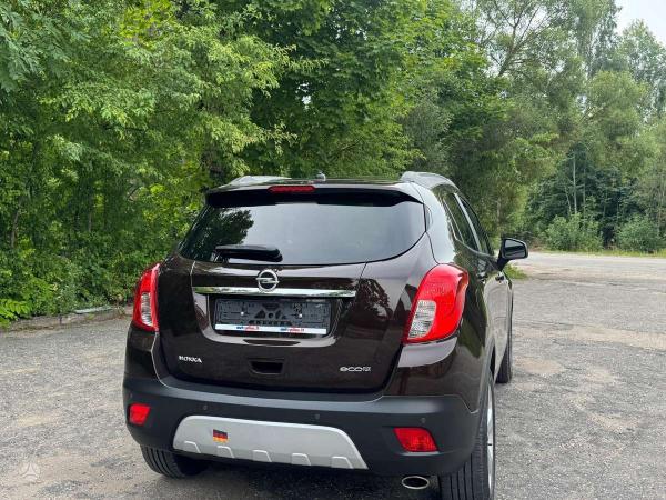 Red Opel Mokka 2014 in Utena, with an engine capacity of 1.69 L and mileage of 247 thousand km for 5800 €, photo 3 on AUTOMOTO.COM.LV