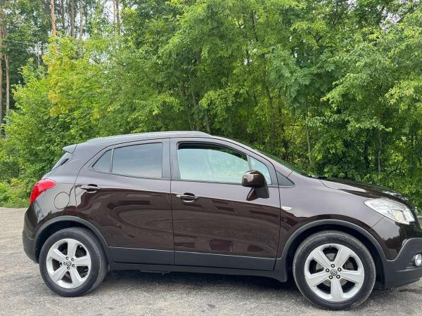 Red Opel Mokka 2014 in Utena, with an engine capacity of 1.69 L and mileage of 247 thousand km for 5800 €, photo 7 on AUTOMOTO.COM.LV