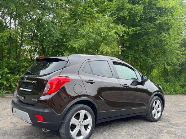 Red Opel Mokka 2014 in Utena, with an engine capacity of 1.69 L and mileage of 247 thousand km for 5800 €, photo 9 on AUTOMOTO.COM.LV