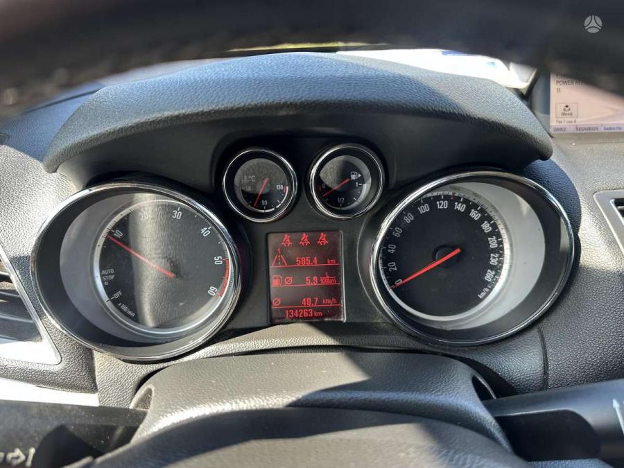 Red Opel Mokka 2014 in Alytus, with an engine capacity of 1.69 L and mileage of 134 thousand km for 8350 €, photo 12 on AUTOMOTO.COM.LV