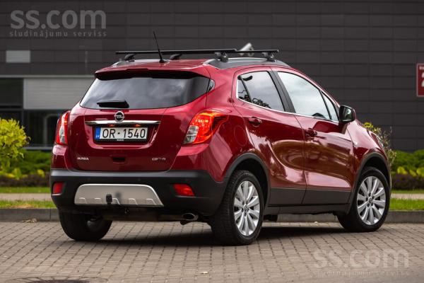 Opel Mokka 2014 in Jelgava on AUTOMOTO.COM.LV Red Opel Mokka 2014 in Jelgava, with an engine capacity of 1.70 L and mileage of 0 thousand km for 7400 €, photo 8 on AUTOMOTO.COM.LV